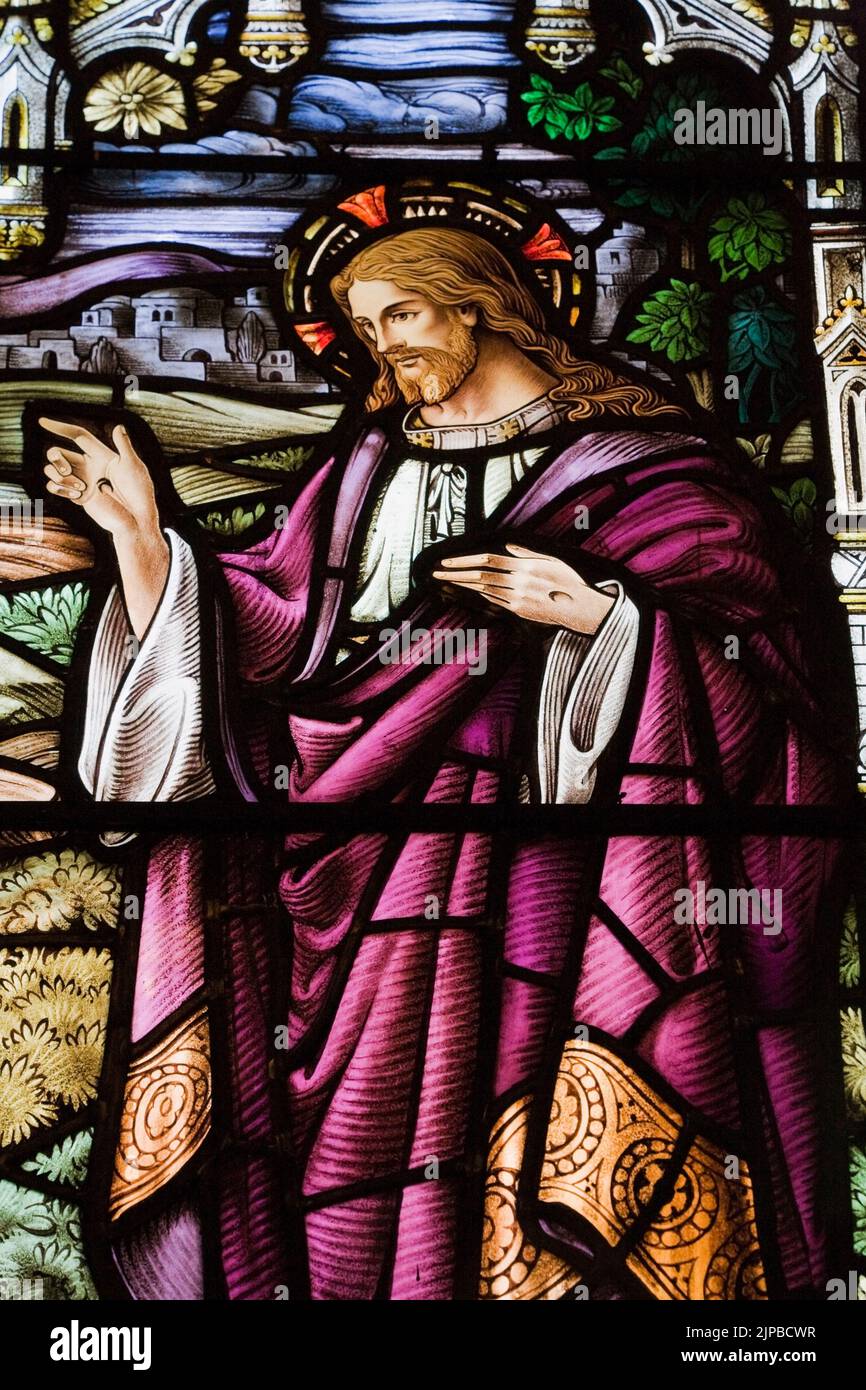 Colourful stained glass window with religious scenes, Saint-George's ...