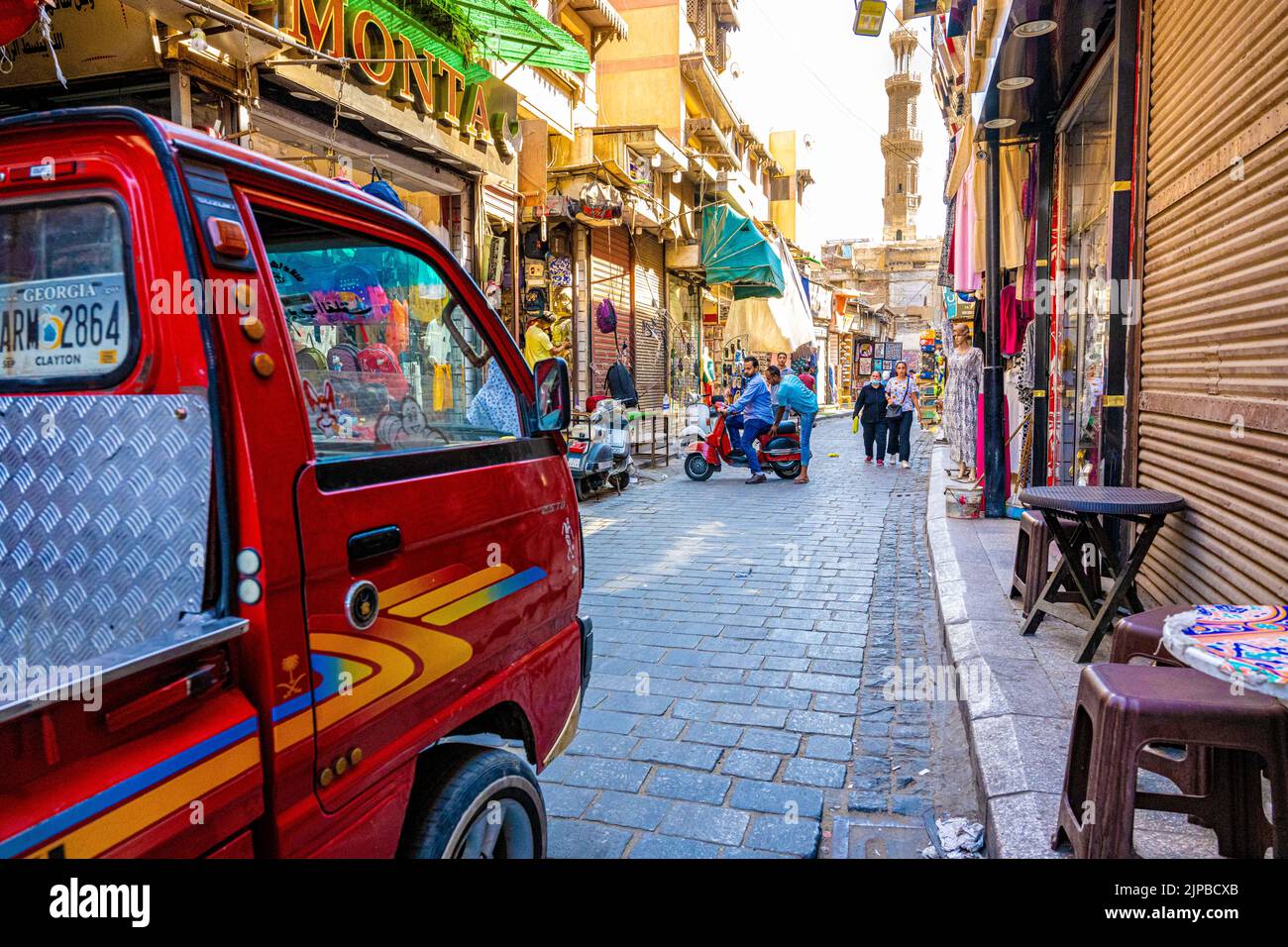 Daily life with local people working and going to shops in a tuktuk in ...