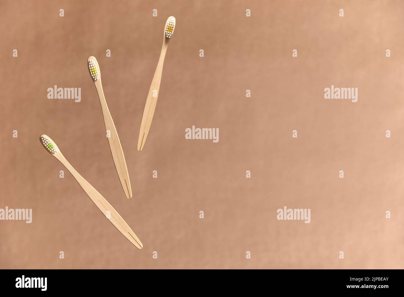 Set of three ecological bamboo toothbrushes. Concepts: sustainability ... Set of three ecological bamboo toothbrushes. Concepts: sustainability ...