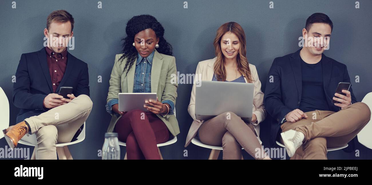All checking the job post for the interview. a group of businesspeople ...