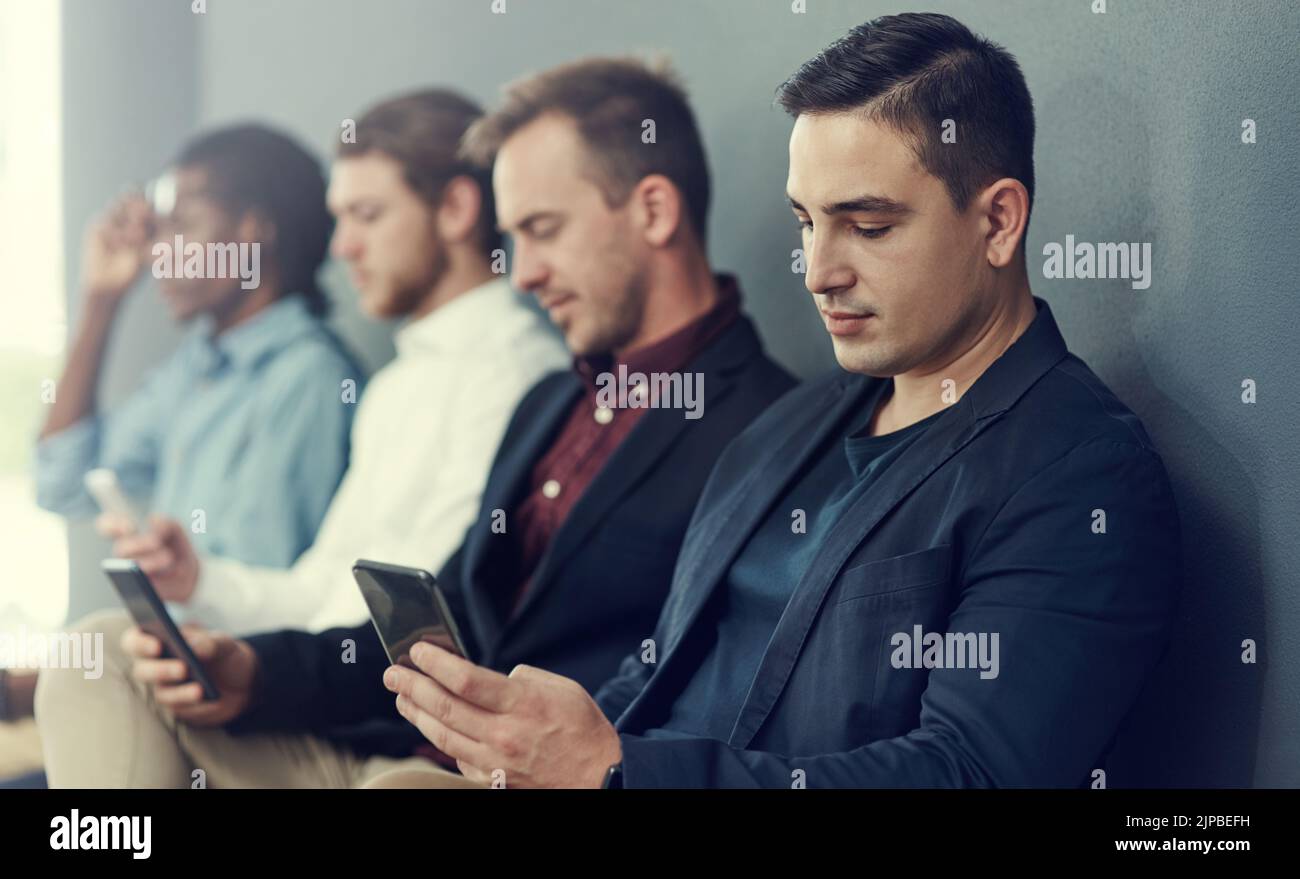 Who will the ideal candidate be. a group of businessmen using different ...