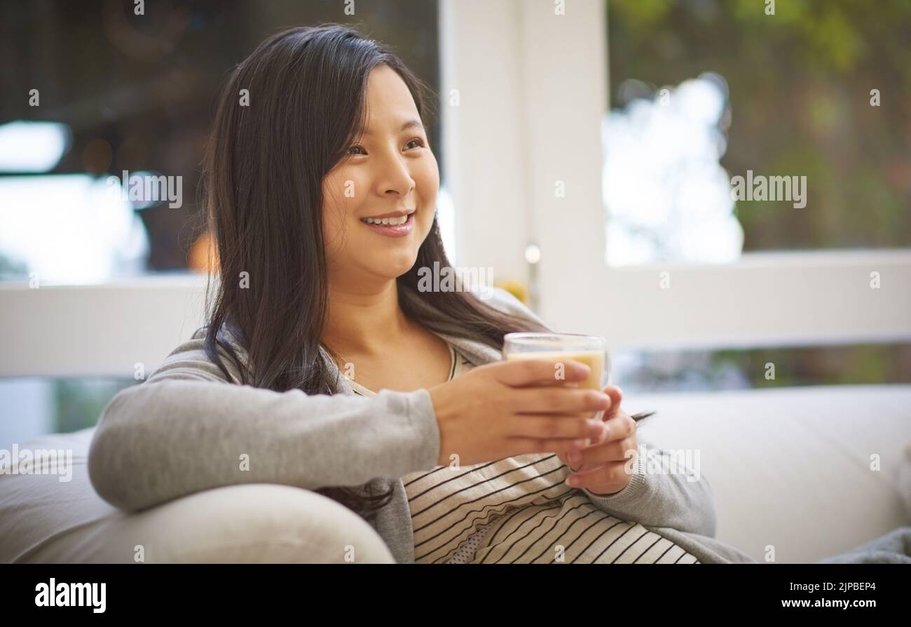 I cant wait to meet my little boy. an attractive young pregnant woman ...