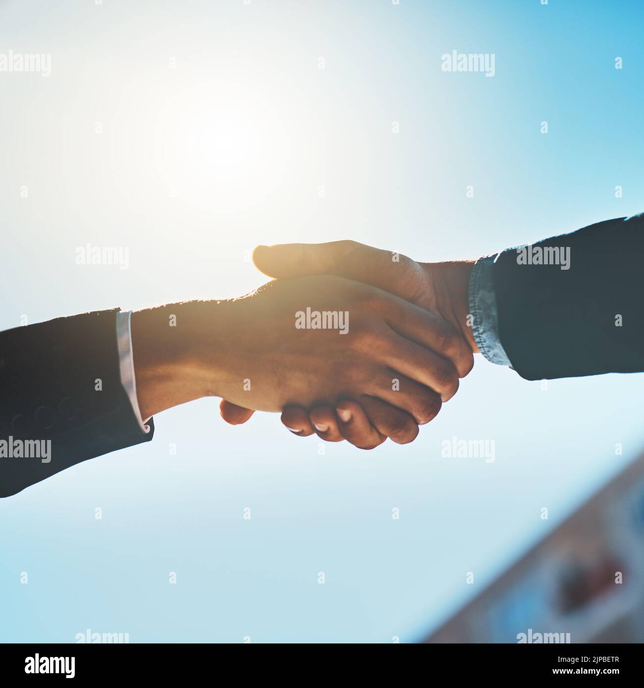 When two bosses become one. two businessmen shaking hands Stock Photo ...