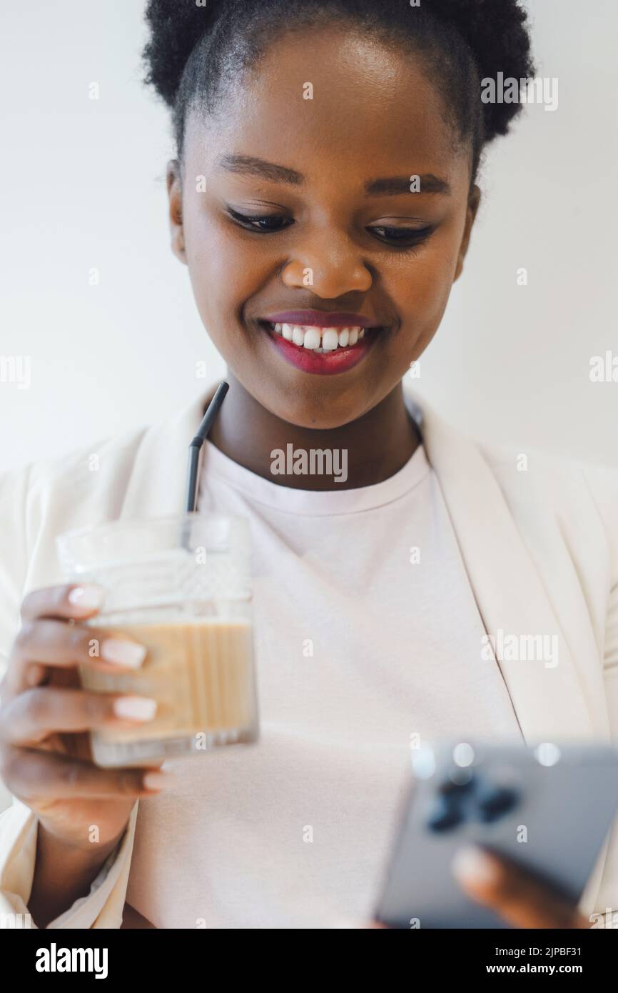 Portrait black woman typing message hi-res stock photography and images ...