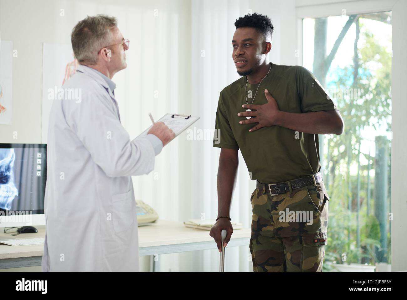 Black ex-soldier with cane came to doctors officer to complain about ...