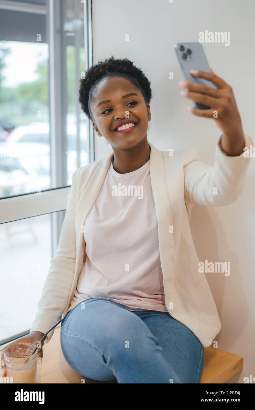 Portrait attractive ethnic girl making hi-res stock photography and ...