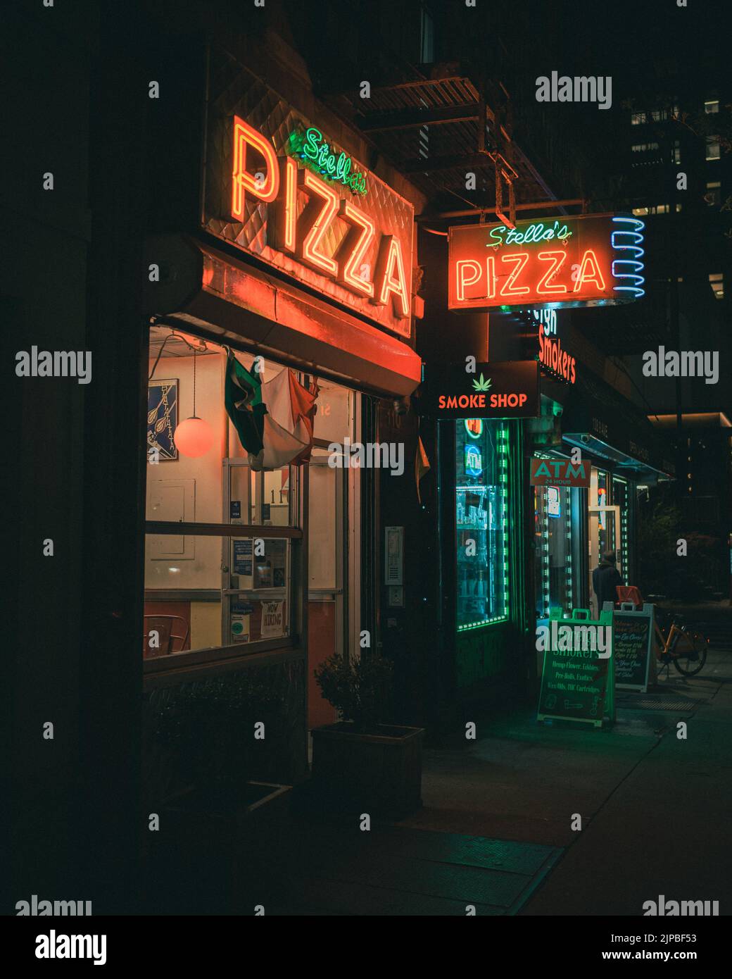 Stellas Pizza neon signs at night, Manhattan, New York Stock Photo - Alamy