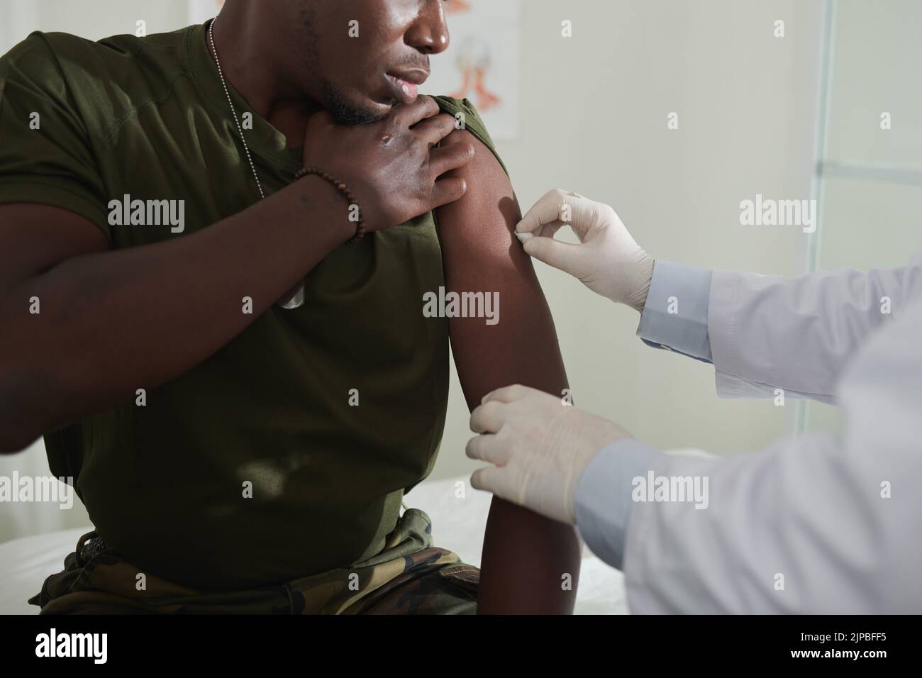 African american soldier examining hi-res stock photography and images ...