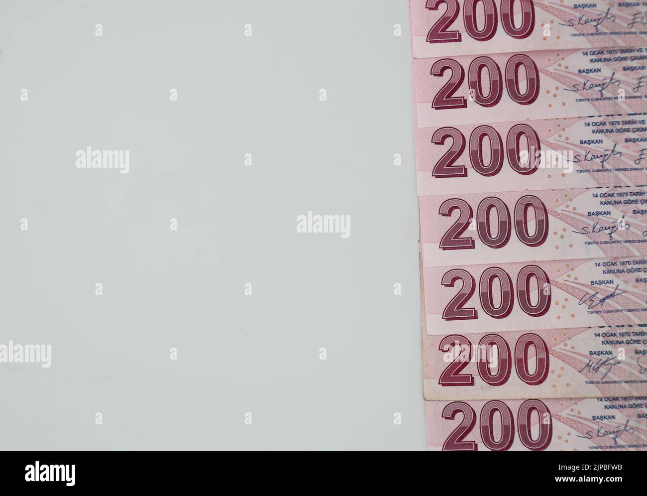 Turkish Lira banknotes of various color, pattern and value on white ...