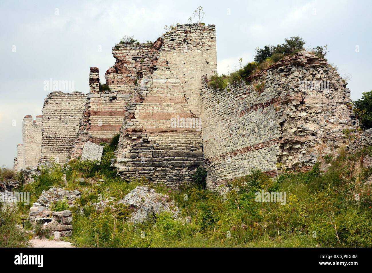 ruins of defense wall with colorful bricks in Istanbul Stock Photo - Alamy