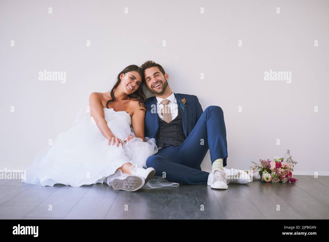 Meet the new Mr and Mrs. Studio portrait of a newly married young ...