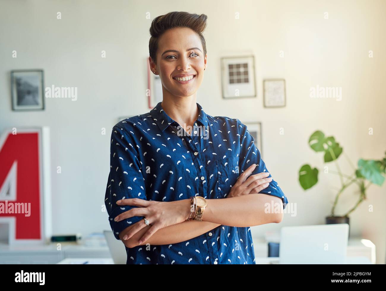 My office is my creative space. Portrait of a creative employee in a ...