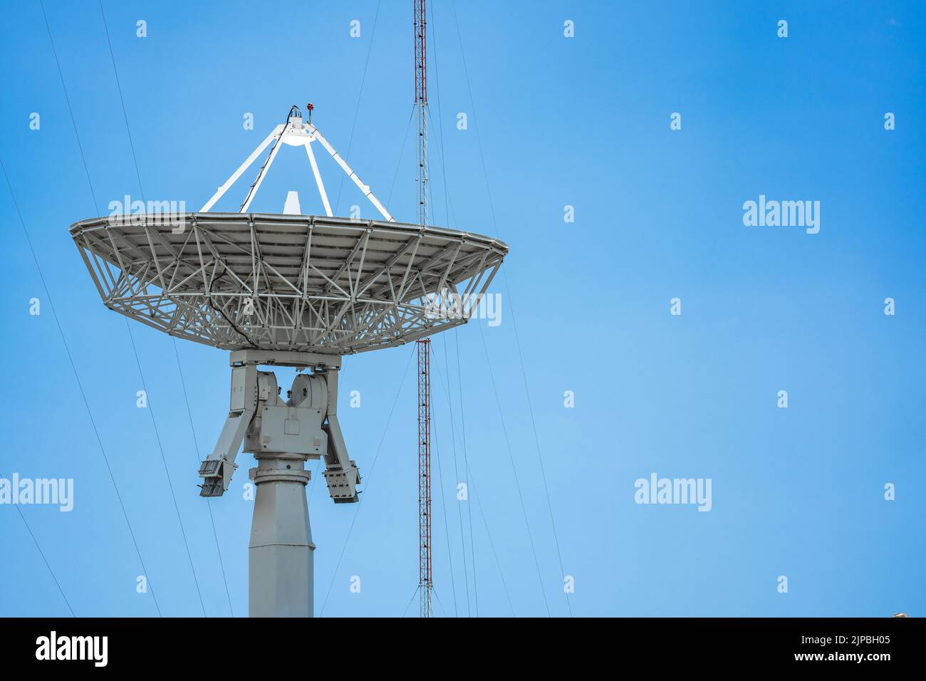 parabolic antenna satellite dish located in front of telecommunication ...