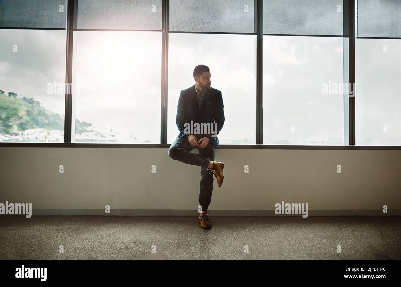 Why wait for opportunity when you can create it. a young businessman ...