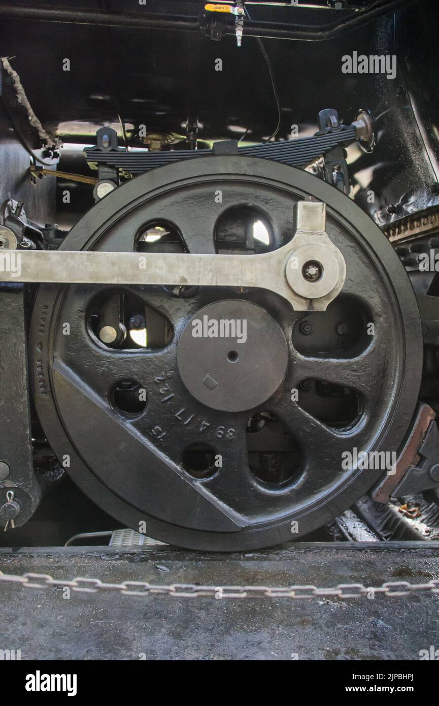 19th-century steam locomotive drive wheel and connecting rod close-up ...