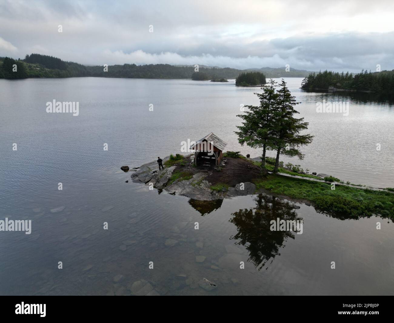 An aerial view of a hut on an islet Stock Photo - Alamy