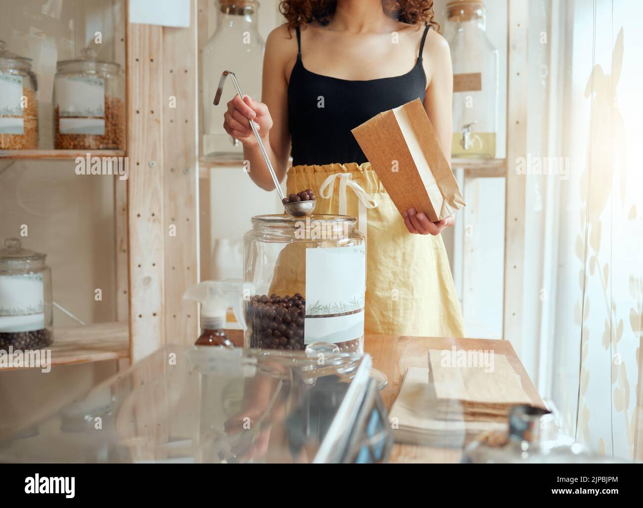 Women packing candy hi-res stock photography and images - Alamy