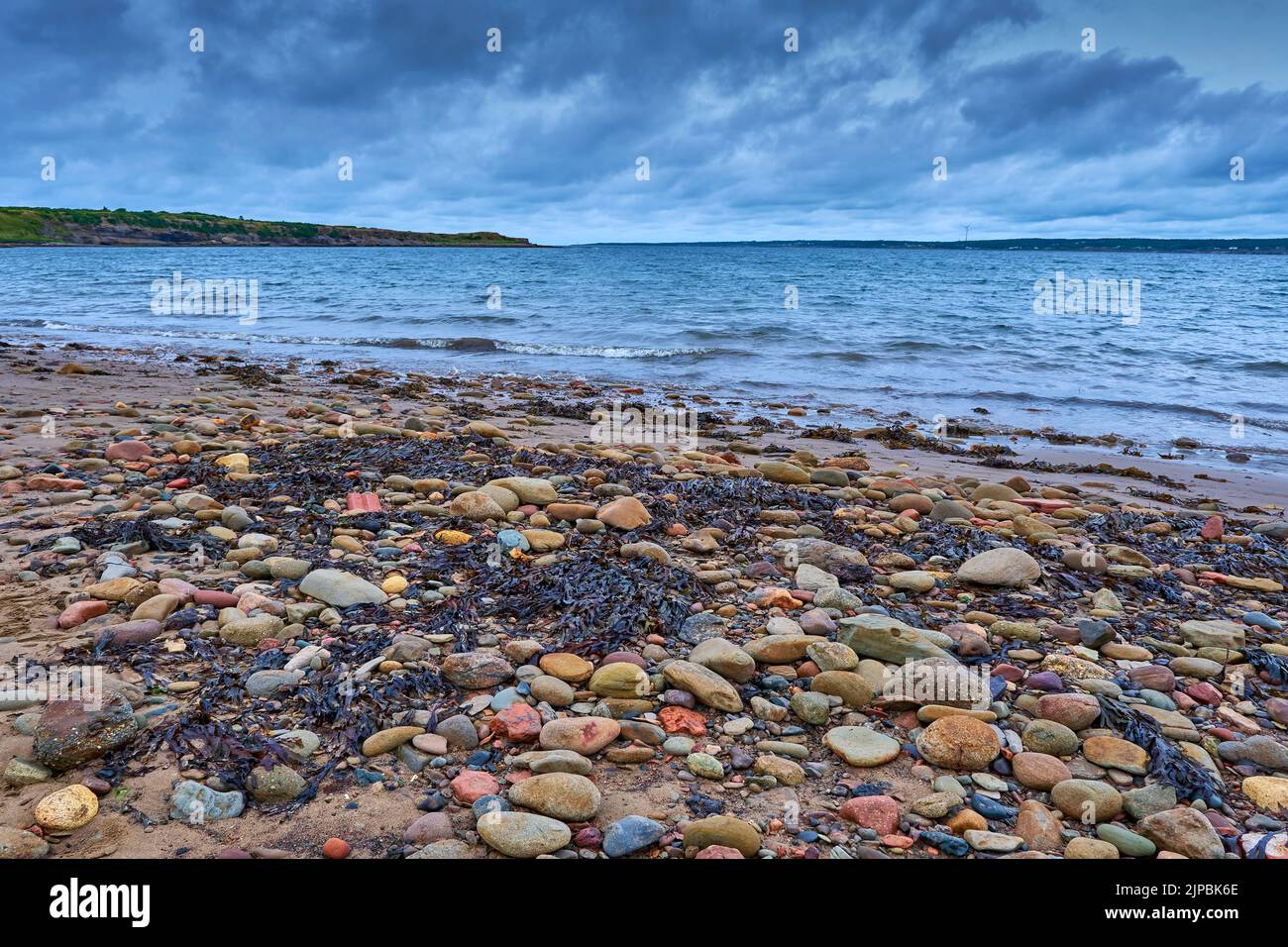 Colourful rocks abound on Lockman's Beach in Sydney Mines Nova Scotia ...