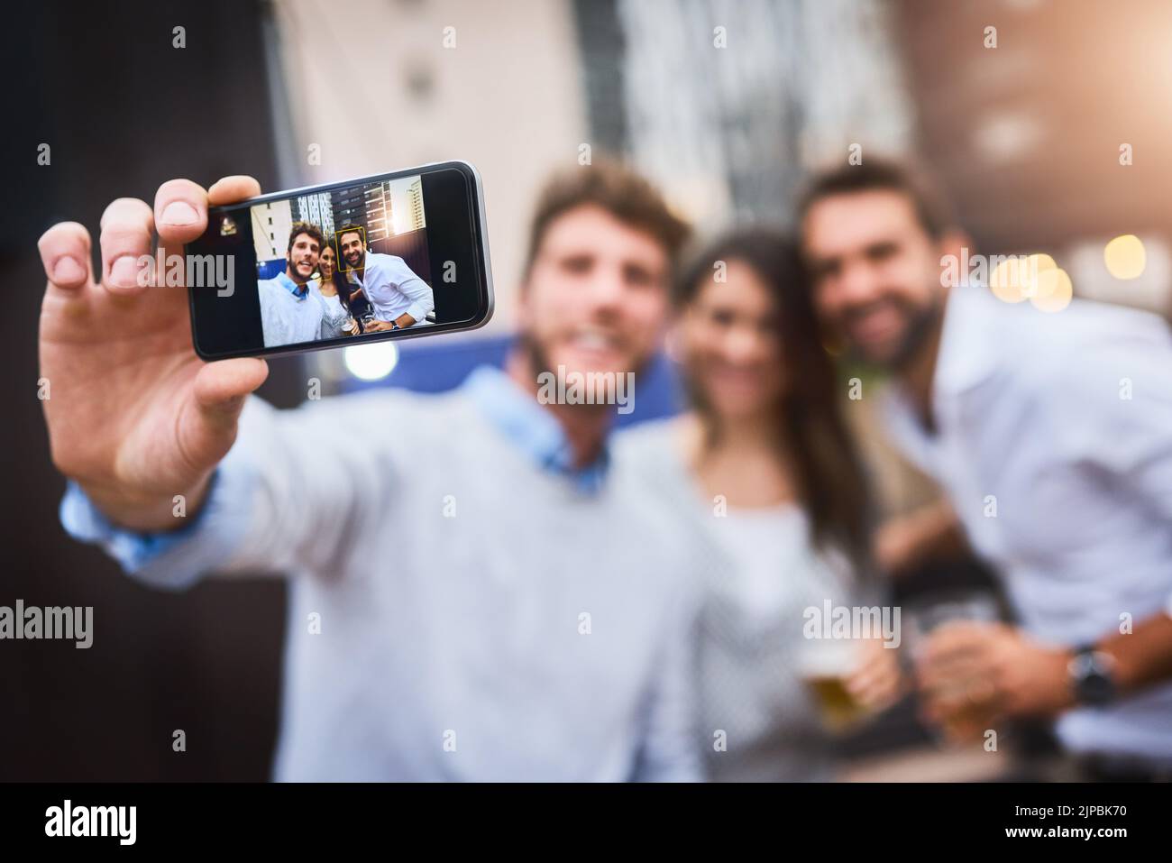 After work memories. businesspeople having drinks on their office ...