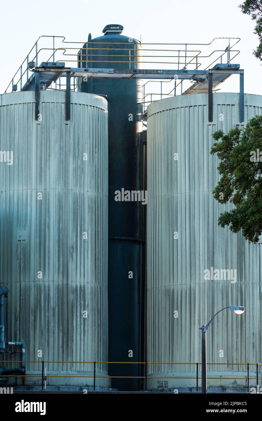 closeup of brewery tanks and equipment at a processing plant concept ...