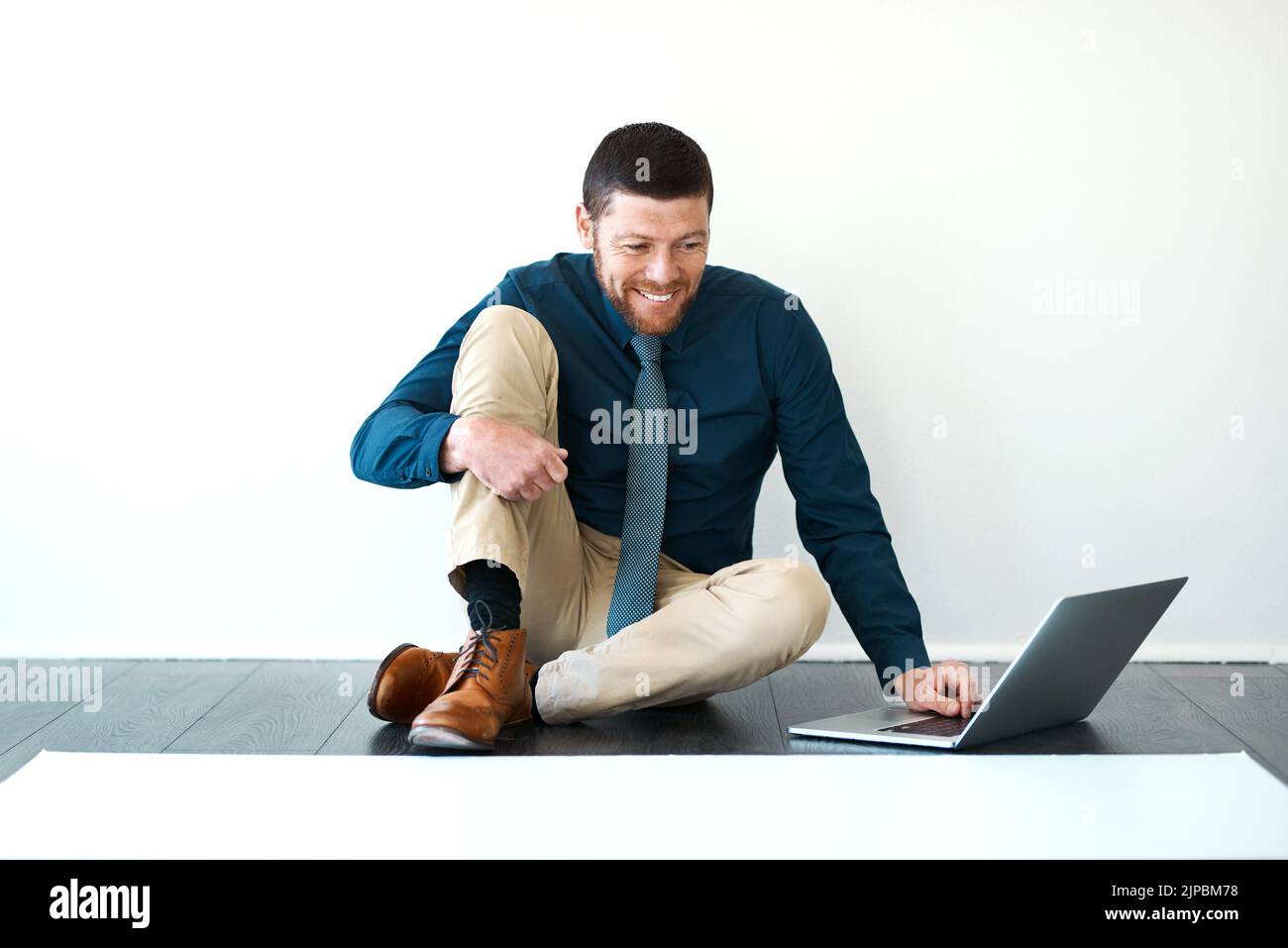 Technology aids in the planning process. Full length shot of a handsome ...