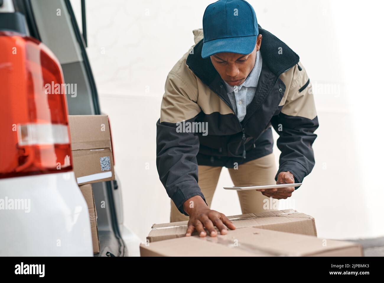 Its all digitized for easier organization. a courier using a digital ...