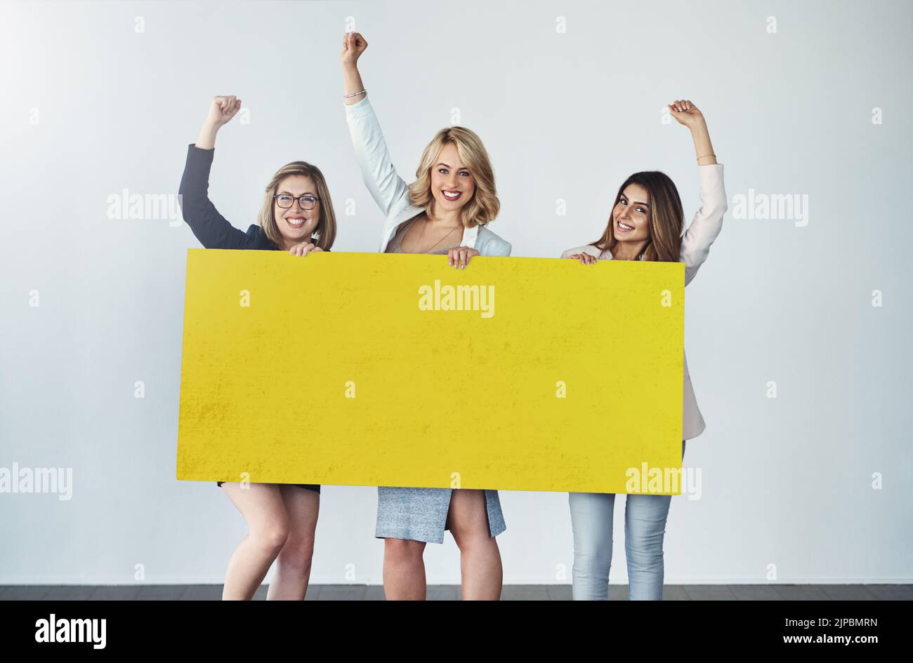 Now this is something worth celebrating. Studio shot of a group of ...