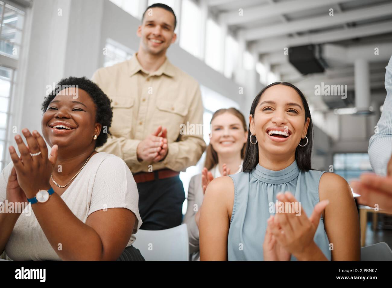 Clapping, celebrating and excited after training presentation, office ...