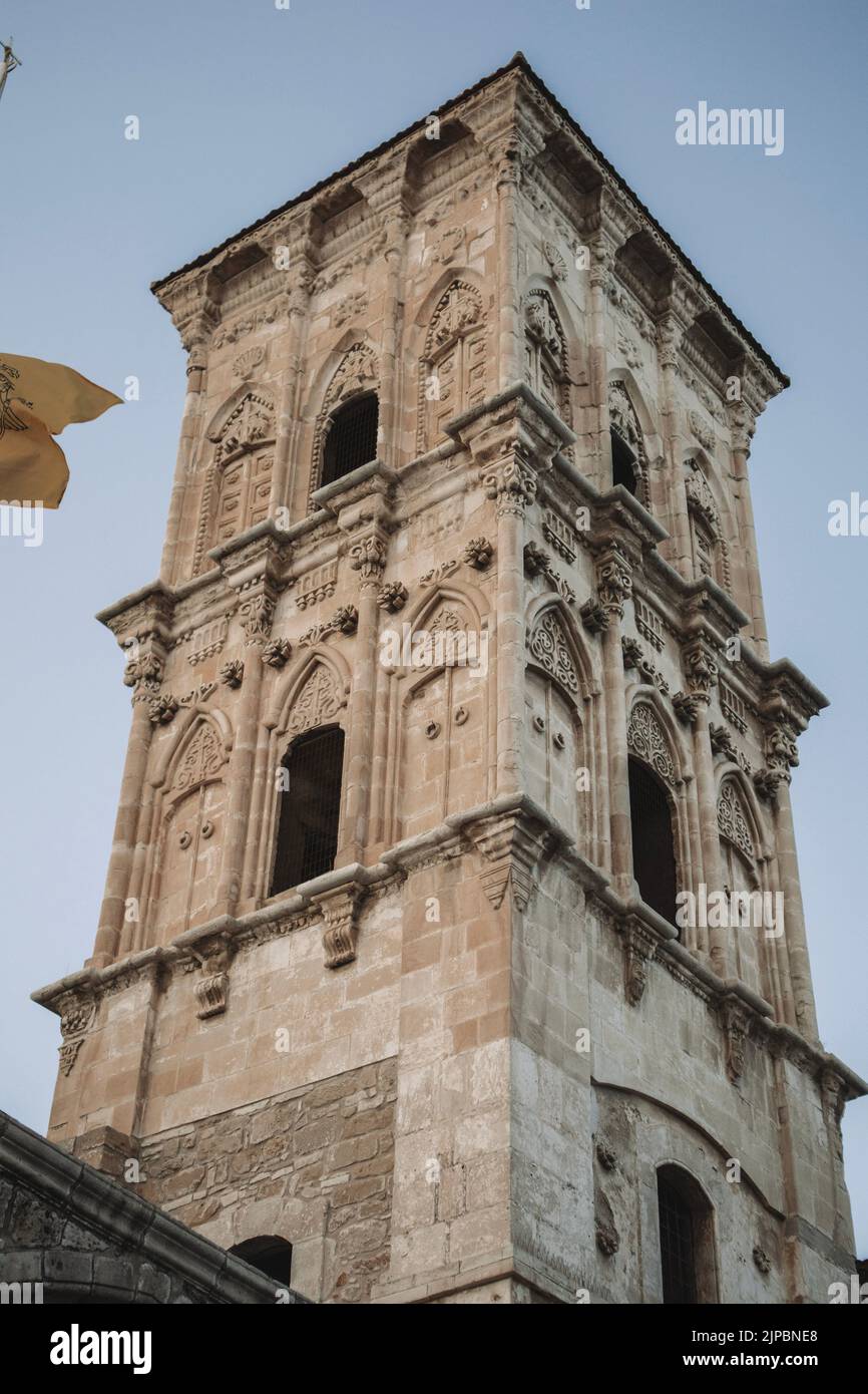 Beautiful old ancient tower with arch and plants of St.Lazarus church ...