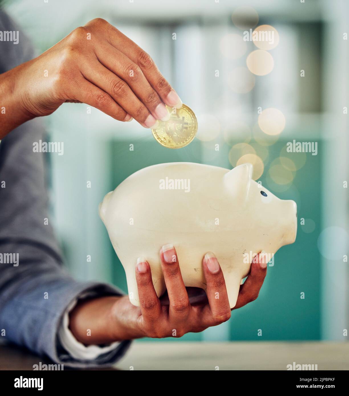 . Savings, investment or a woman putting a coin into a piggybank for ...