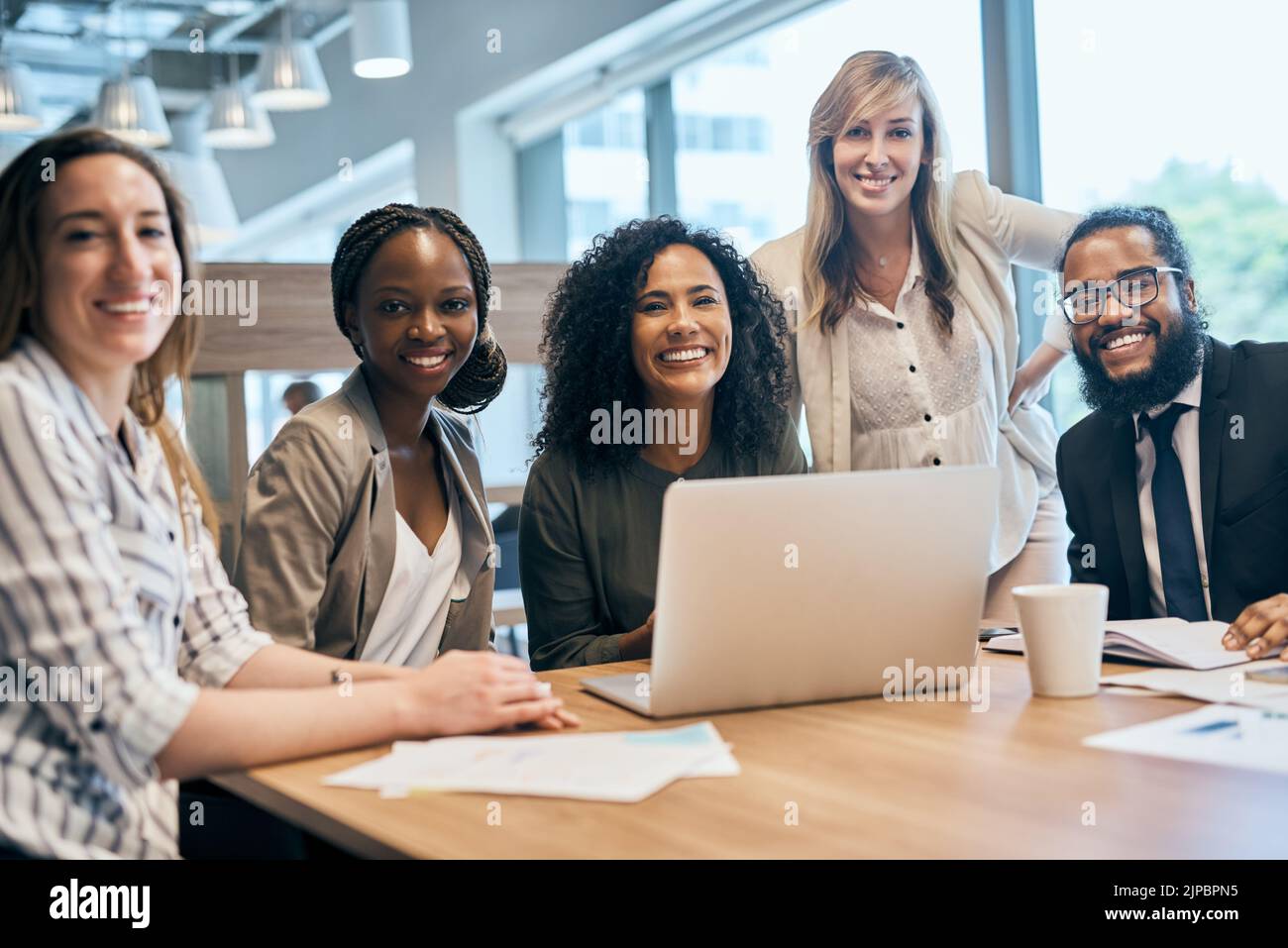 The team working together again. Portrait of a group of focussed ...