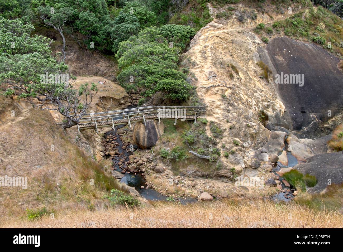 Walkway Bridge built upon a rock, in a gorge, near the ocean. Homunga ...