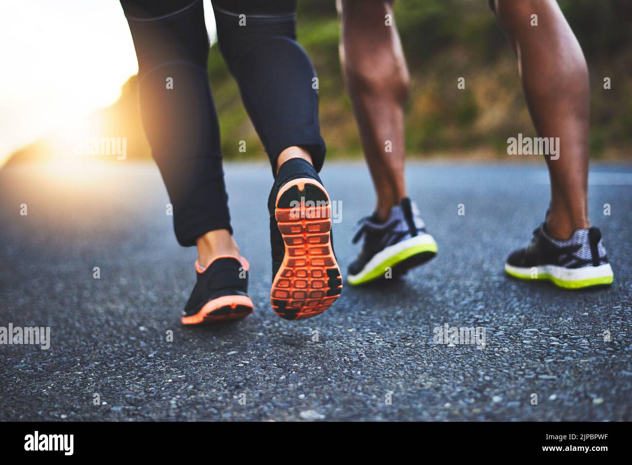 Its not where you run its who you run with. Low angle shot of an unrecognizable couple out ...