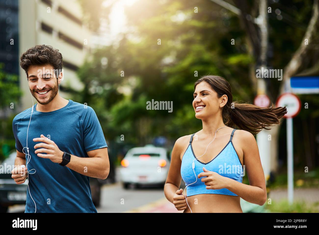 Two people running with heart hi-res stock photography and images - Alamy