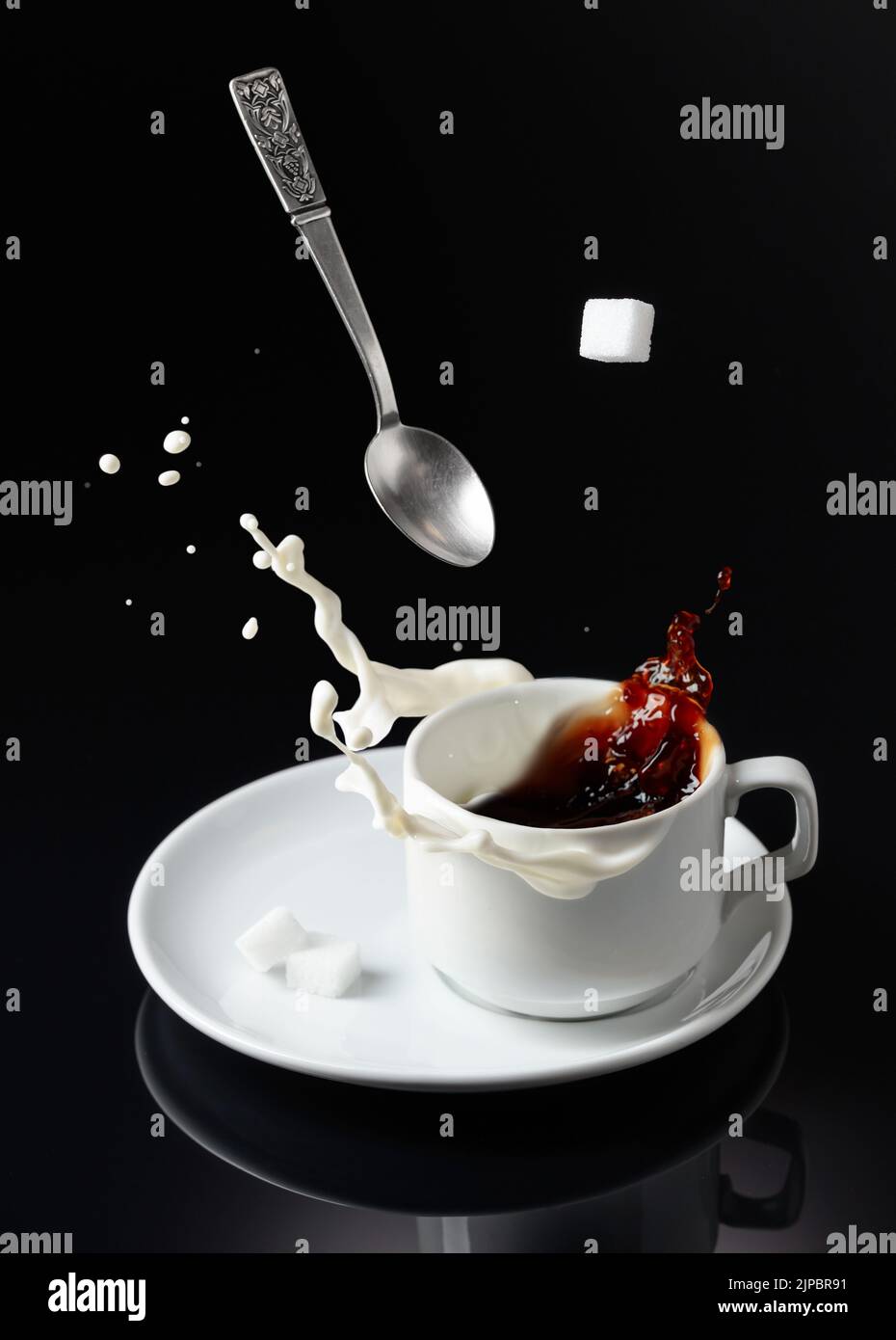 Milk splashing cup hi-res stock photography and images - Alamy