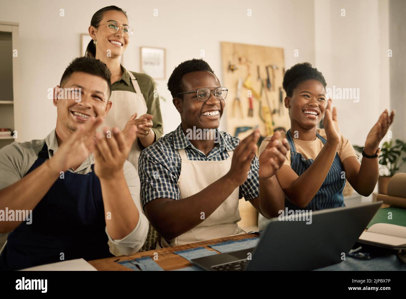 Clapping, cheering and excited fashion design team celebrate at ...