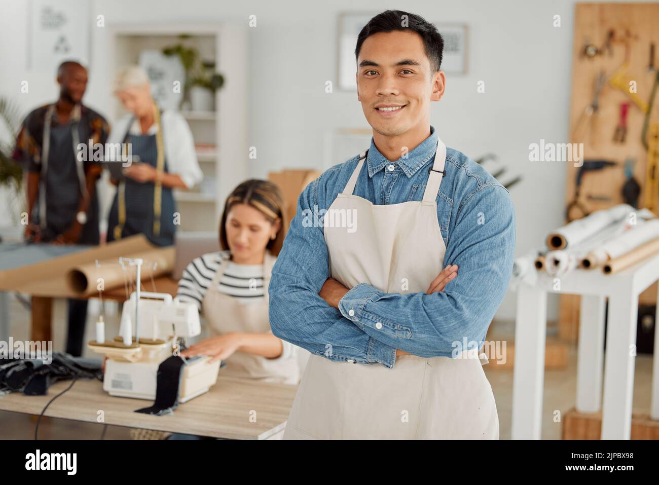 Proud clothing factory manufacturing manager portrait inside office ...