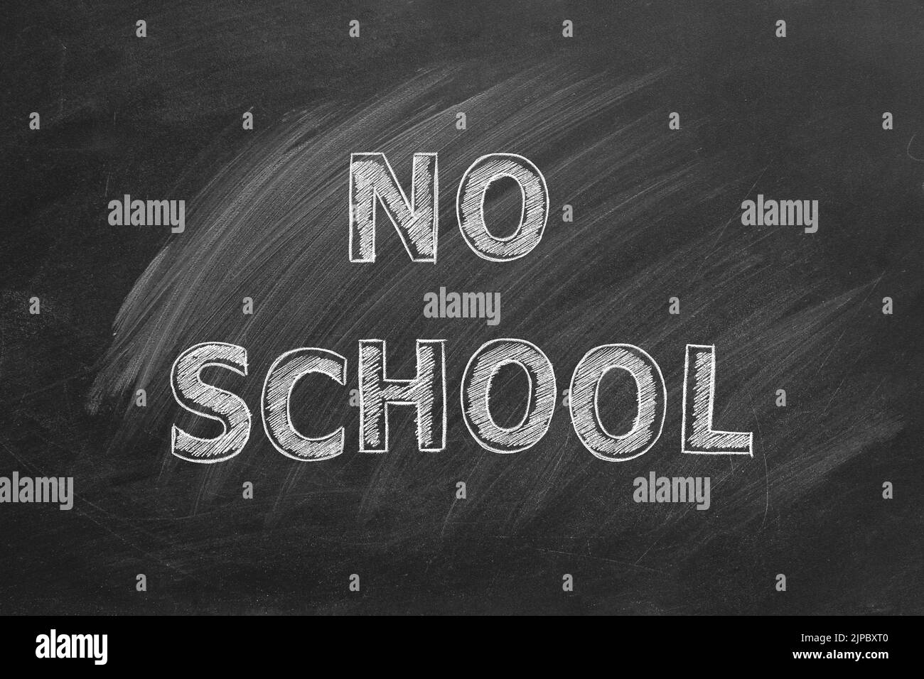 Hand drawn text NO SCHOOL on blackboard Stock Photo - Alamy