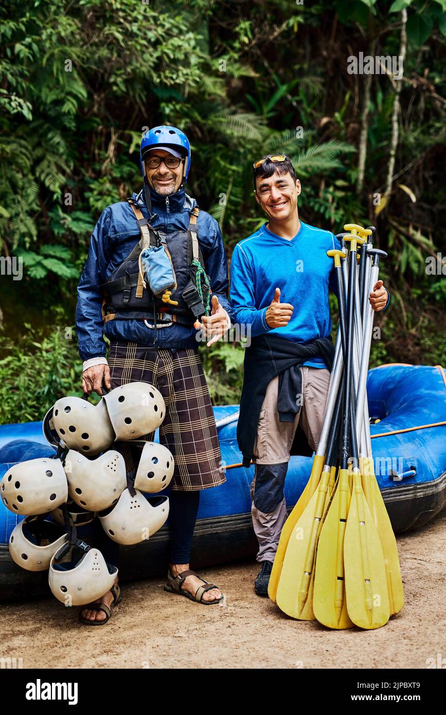 We got all the gear well ever need. Portrait of two cheerful men ...