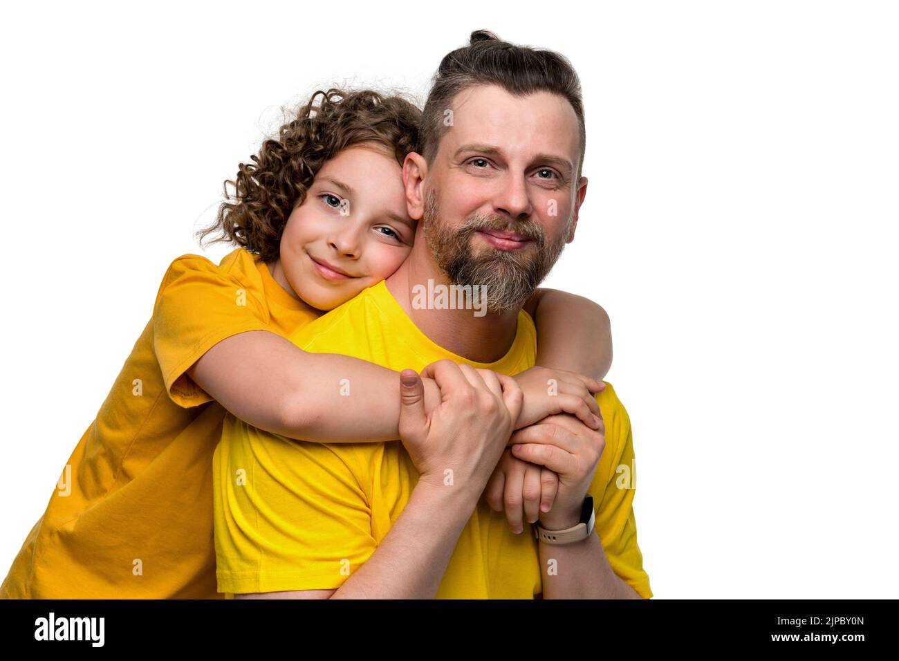 Handsome daddy holding piggyback adorable 10-12s daughter. Female child ...