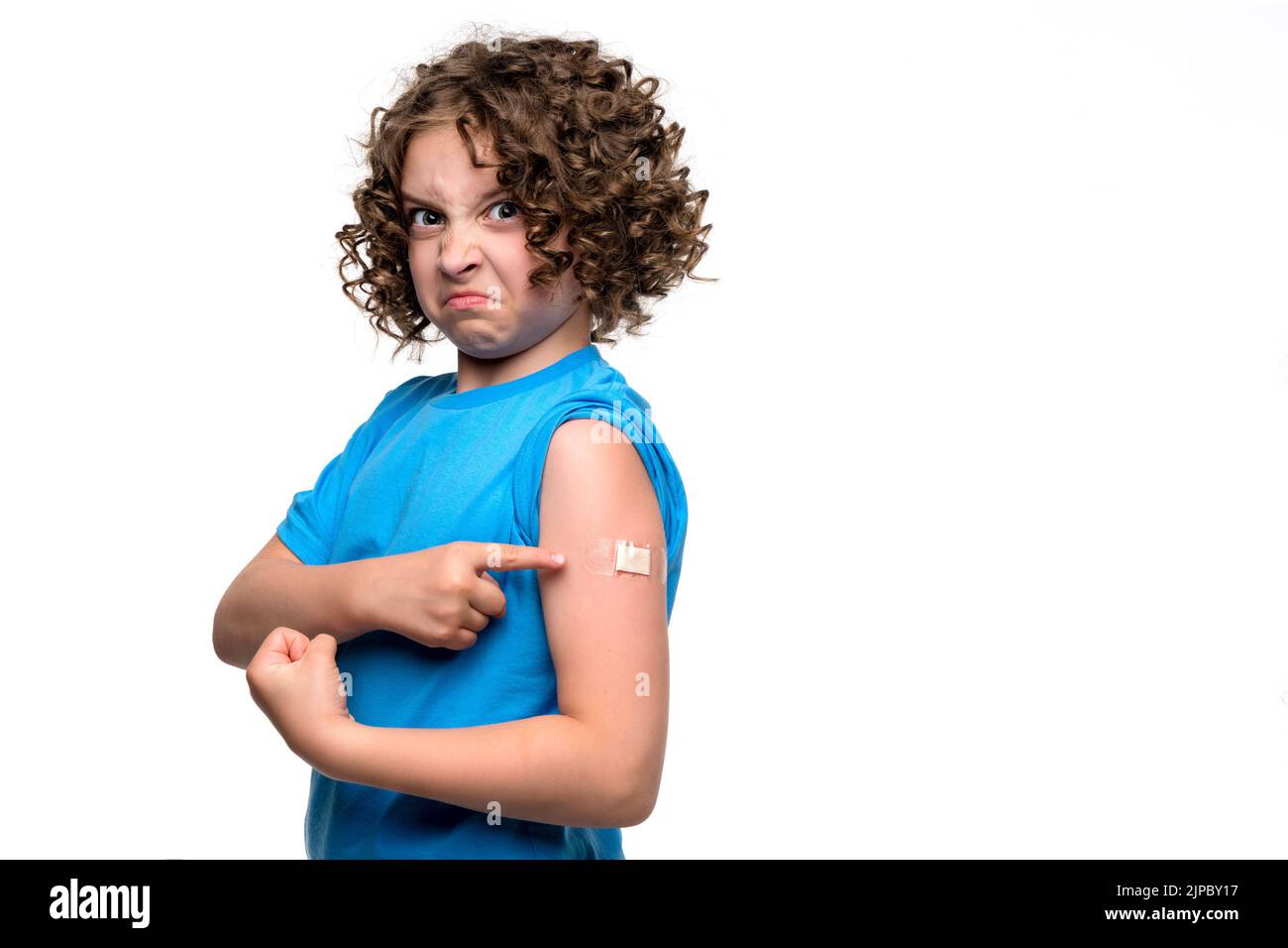 Dissatisfied angry female child girl 12-12s in light blue t-shirt ...