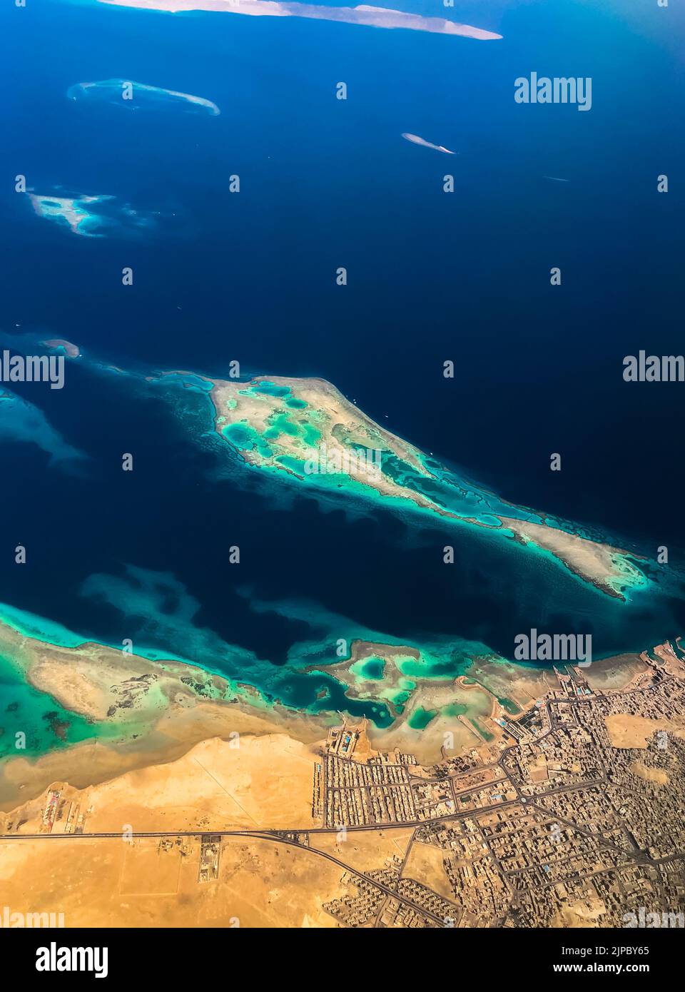 Aerial top view from airplane coastline Egyptian Desert islands. Red ...