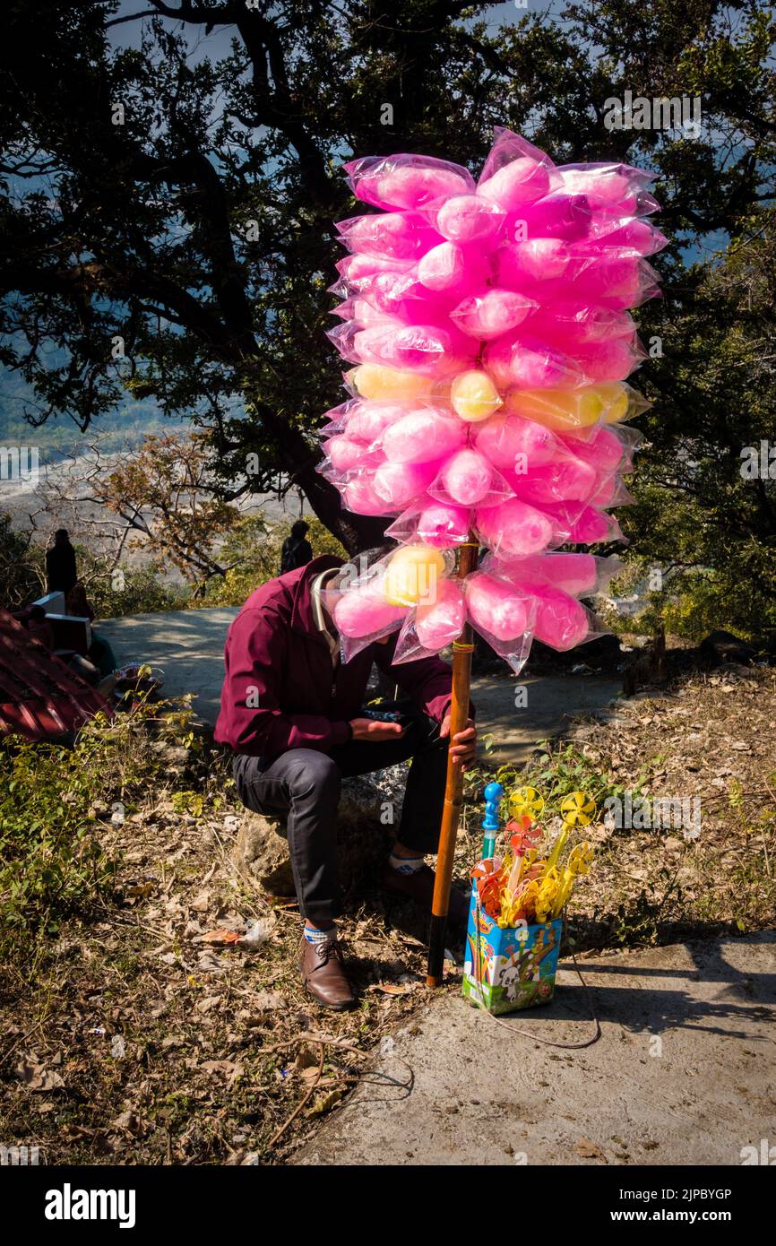 Man selling cotton candy in hi-res stock photography and images - Alamy