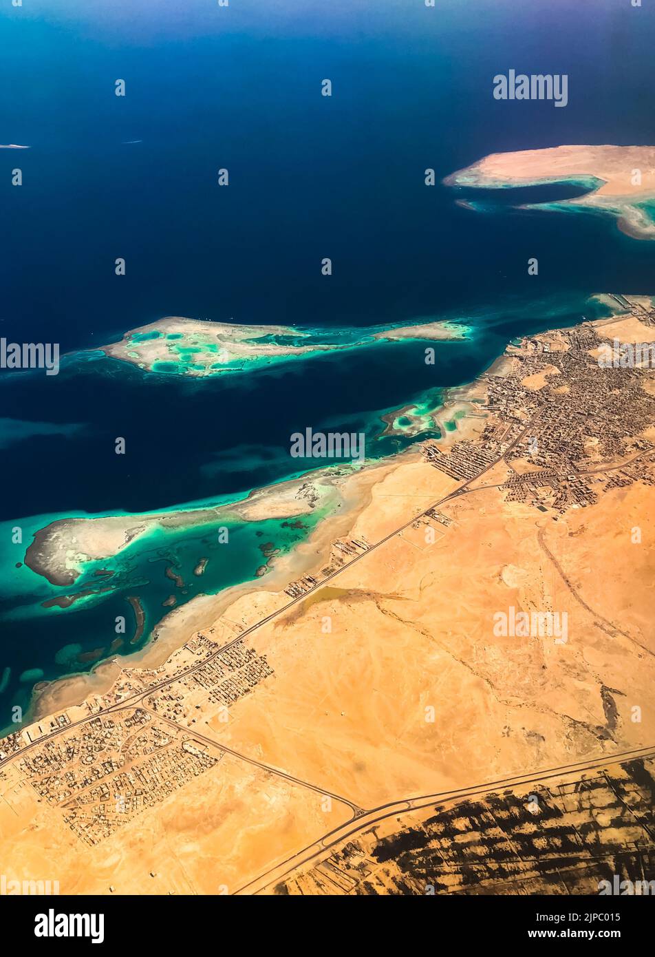 Aerial top view from airplane coastline Egyptian Desert islands. Red ...