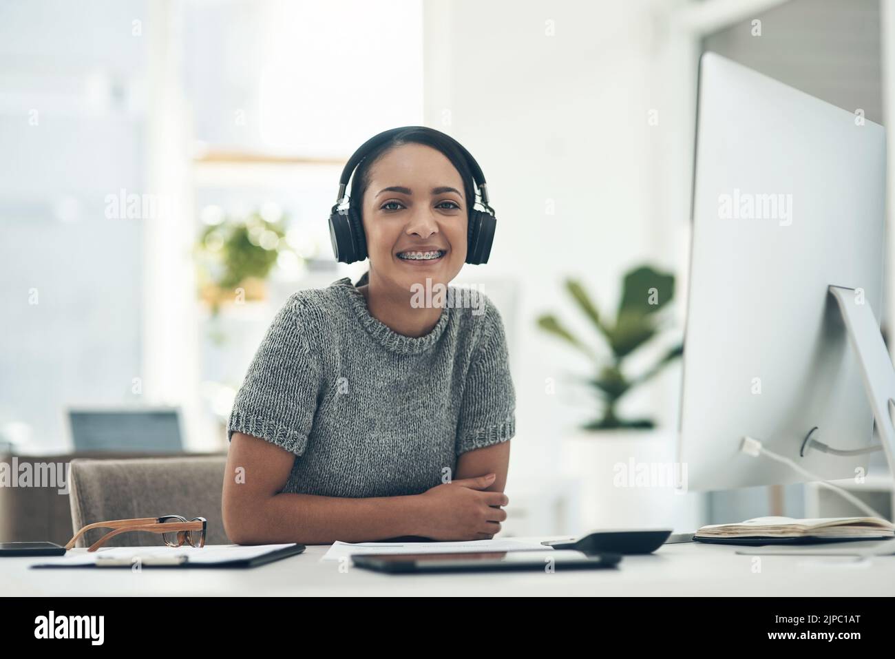 Relaxed office worker sitting hi-res stock photography and images - Alamy