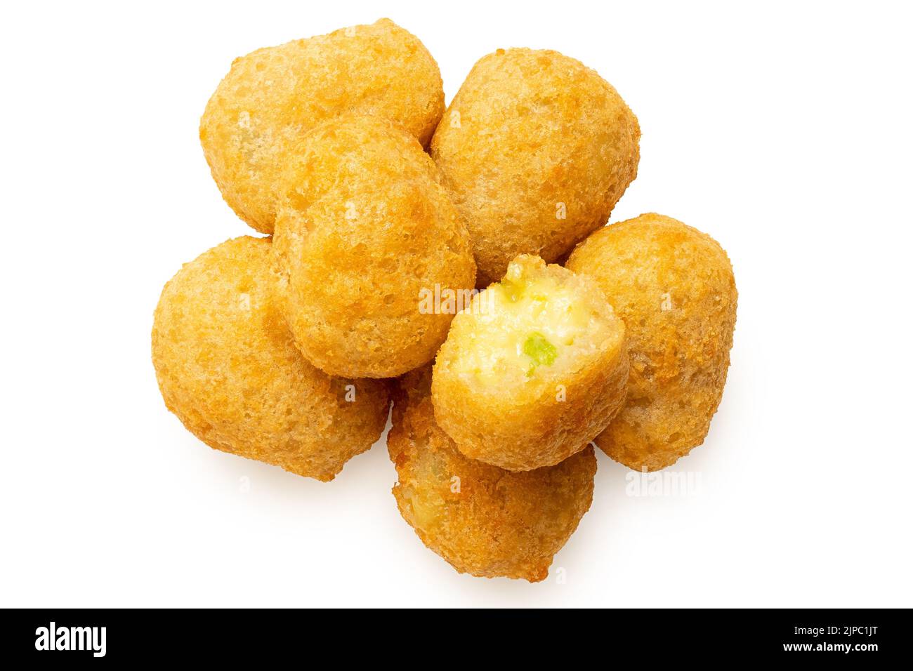 Pile of fried breaded chilli cheese nuggets isolated on white. One ...