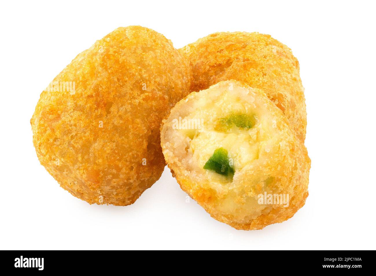 Three fried breaded chilli cheese nuggets isolated on white. One eaten ...
