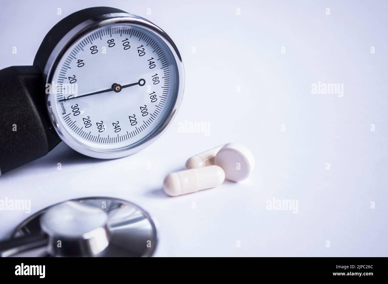 blood pressure monitor, tonometer and tablets Stock Photo - Alamy