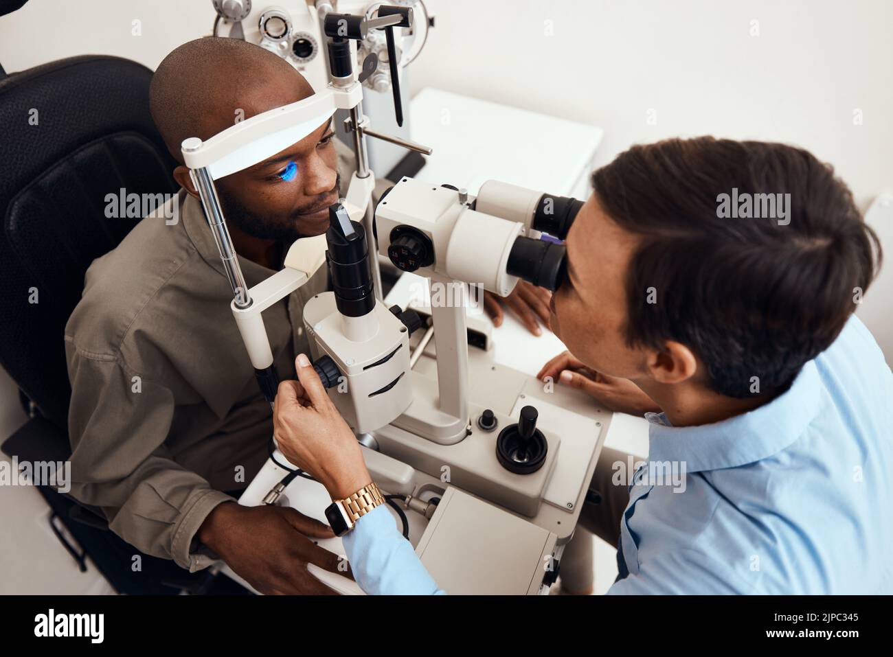 Eye, vision or sight test or exam of a patient above at an optometrist ...