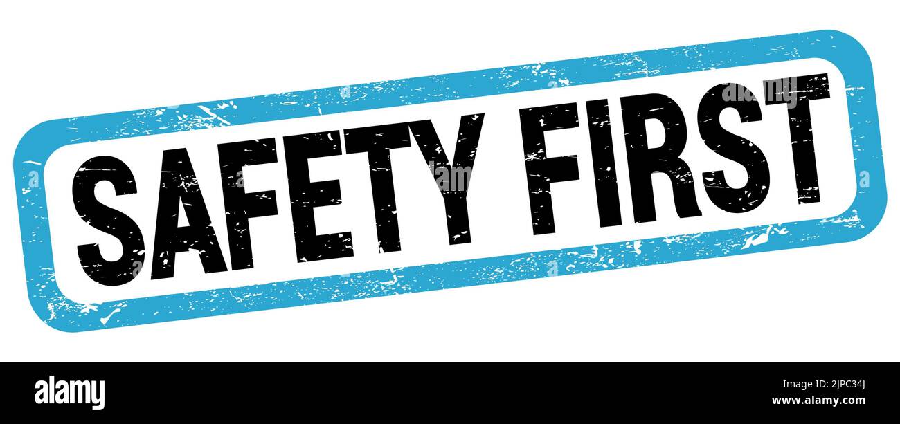 SAFETY FIRST text written on blue-black rectangle stamp sign Stock ...